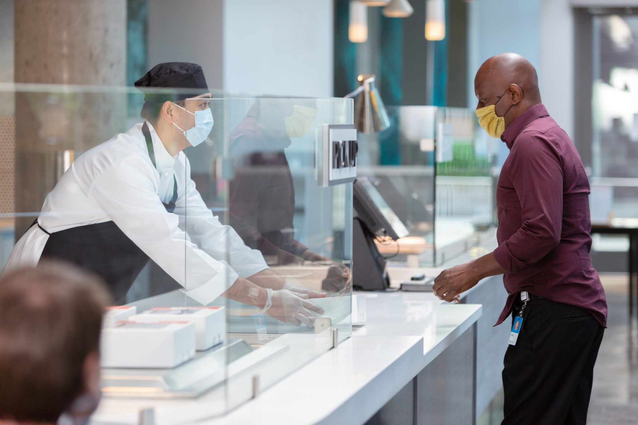 Employee purchases a meal on a Microsoft campus